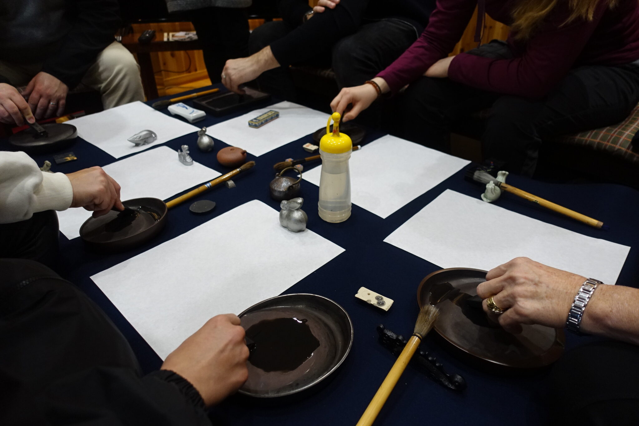 Experience calligraphy using an Akama inkstone - Heartland Japan