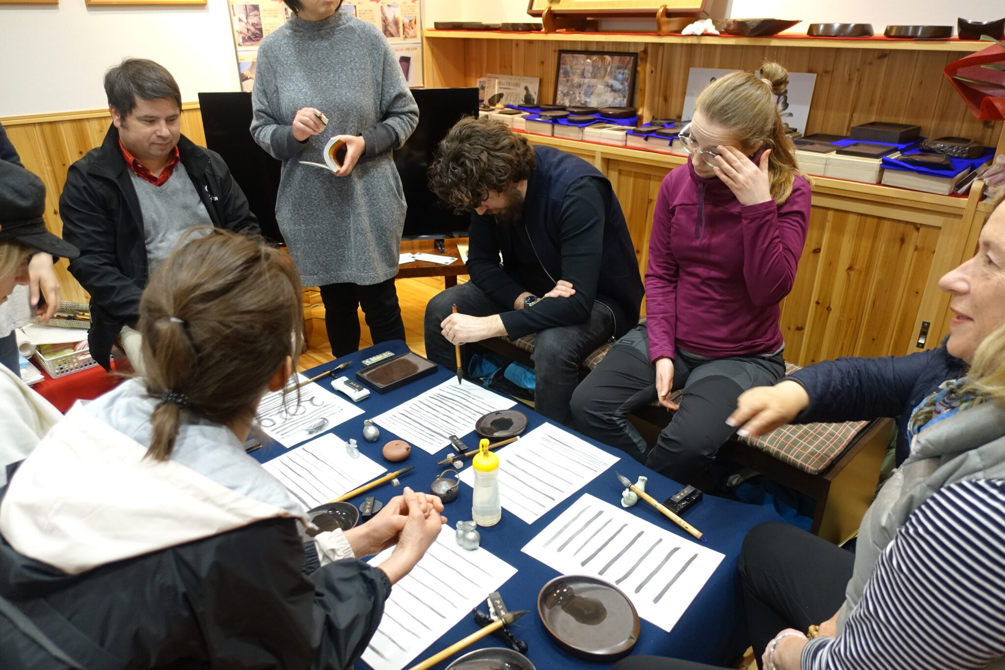 Experience calligraphy using an Akama inkstone - Heartland Japan